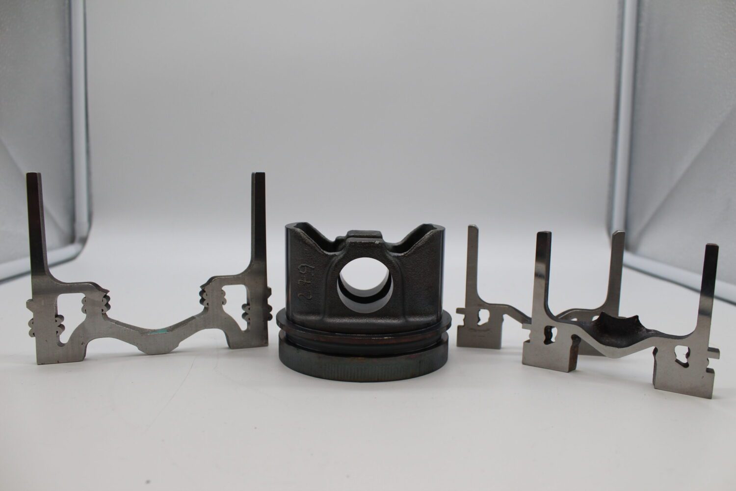 Piston w/ cross sections - FWT | Friction Welding Technologies